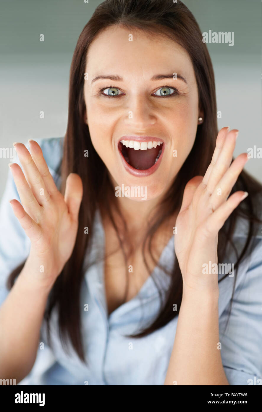 Studio portrait of surprised woman Stock Photo - Alamy