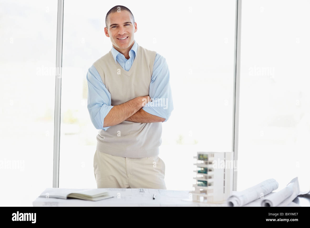 Portrait of architect with apartment model Stock Photo - Alamy