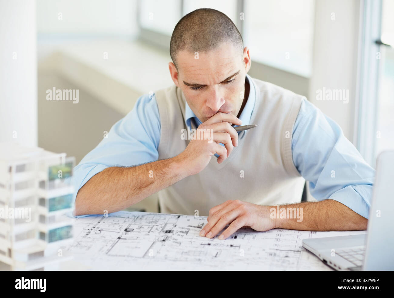 Architect working in office Stock Photo - Alamy
