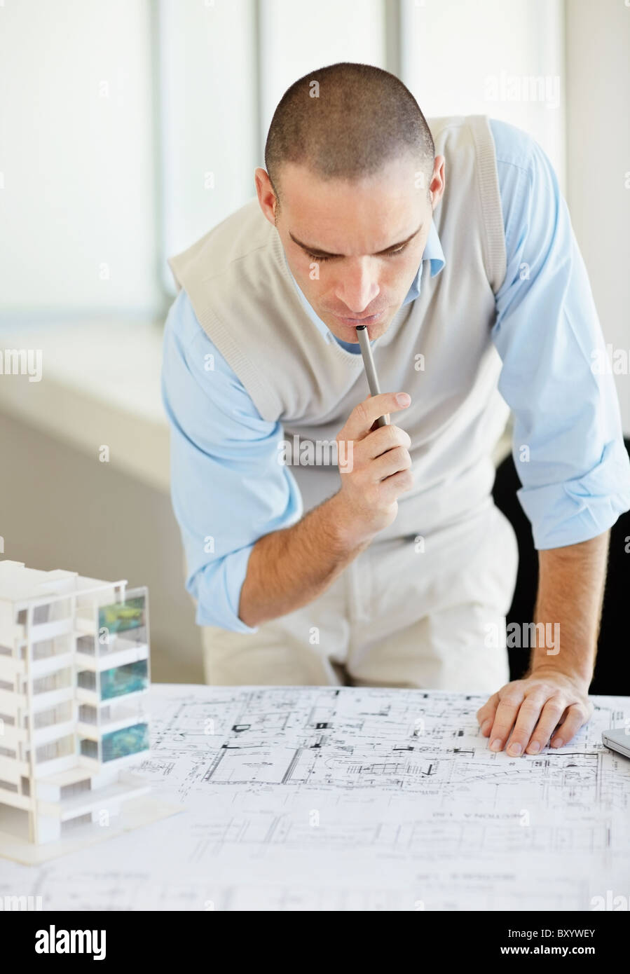 Architect working in office Stock Photo - Alamy