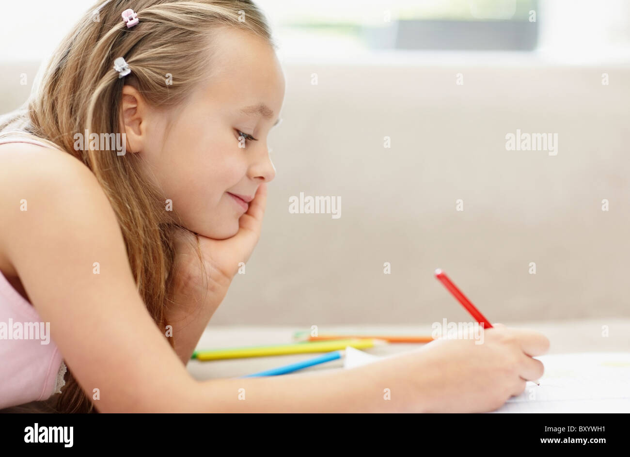 Girl doing homework Stock Photo - Alamy