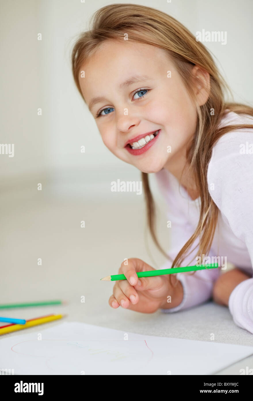 Girl drawing looking over shoulder hi-res stock photography and images ...