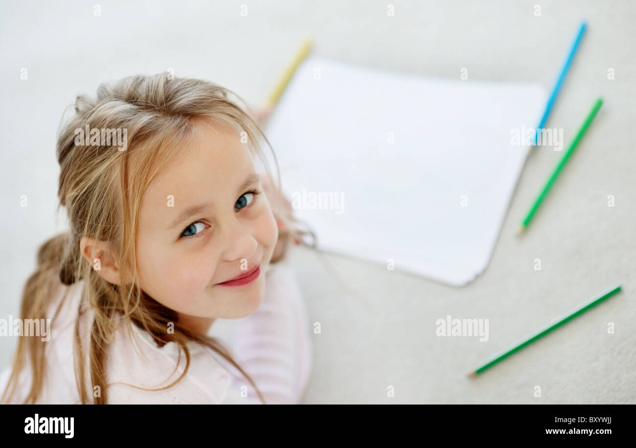 Girl drawing looking over shoulder hi-res stock photography and images ...