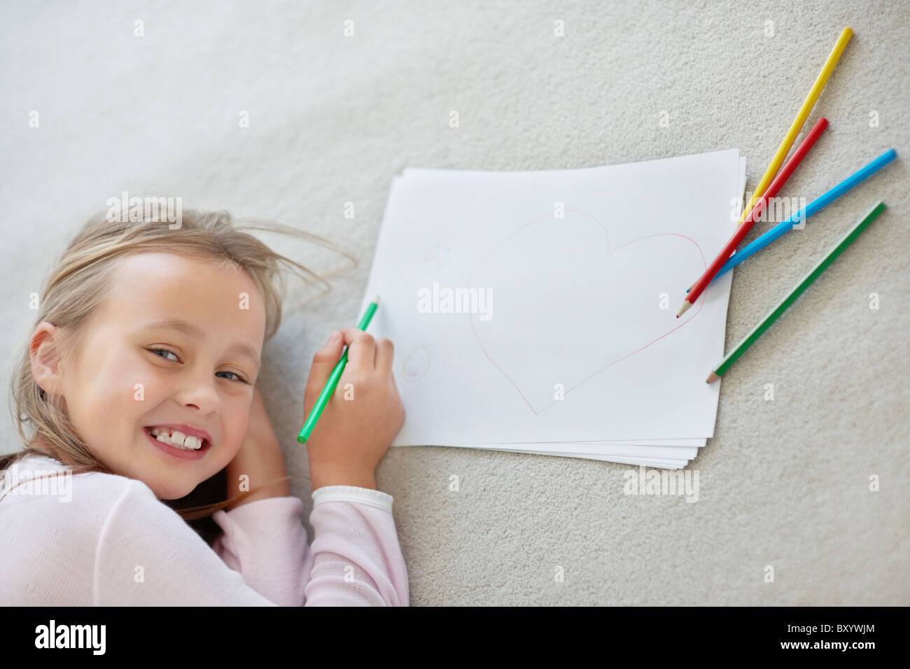 Girl drawing looking over shoulder hi-res stock photography and images ...