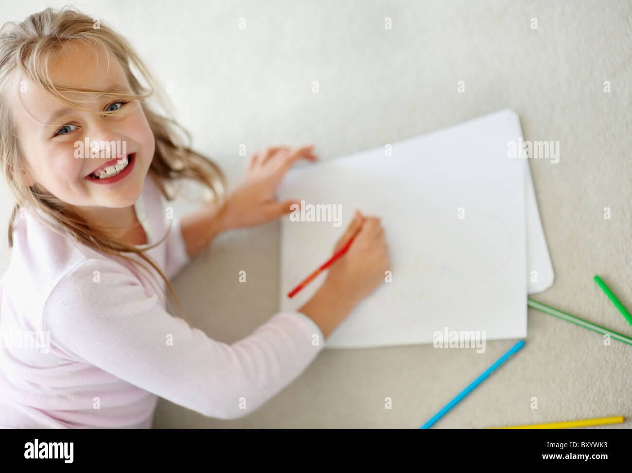 Girl drawing looking over shoulder hi-res stock photography and images ...