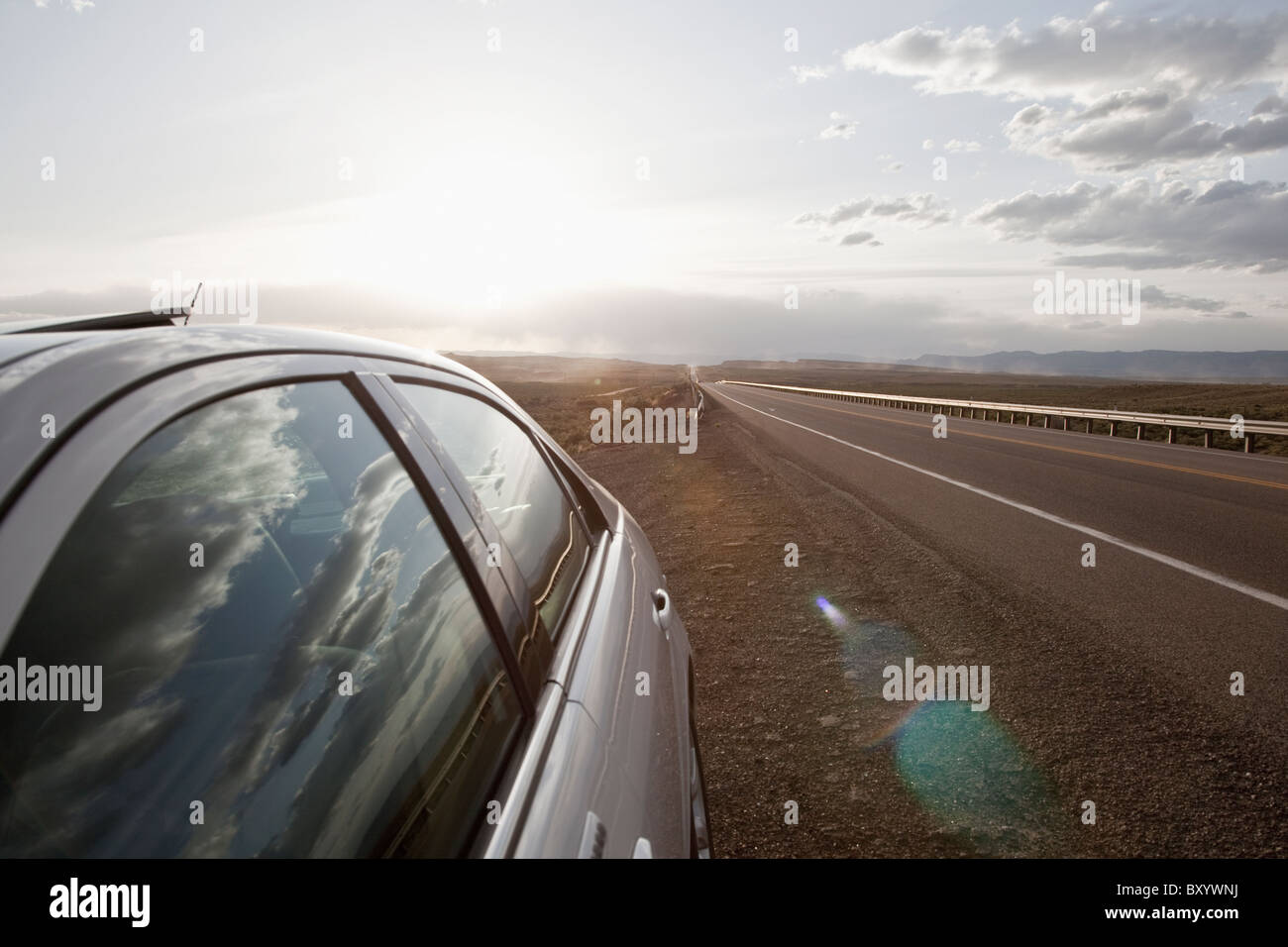 Car on empty freeway Stock Photo - Alamy