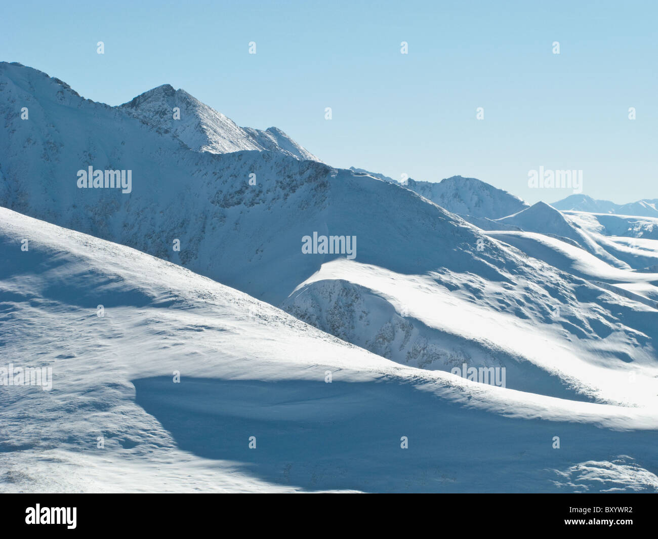 Snow covered mountain range Stock Photo - Alamy