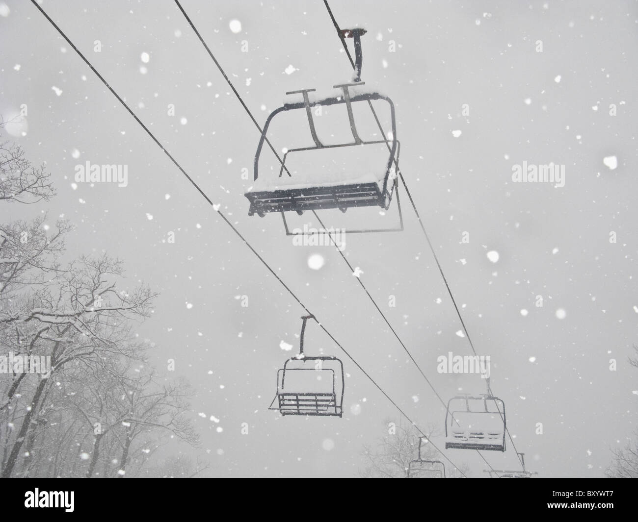 Ski resort lift snowing hi-res stock photography and images - Alamy