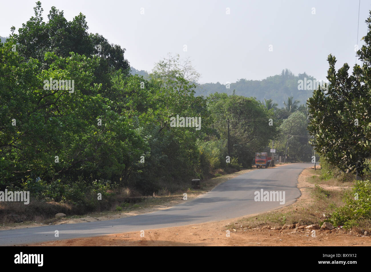 A lonely village road Stock Photo - Alamy