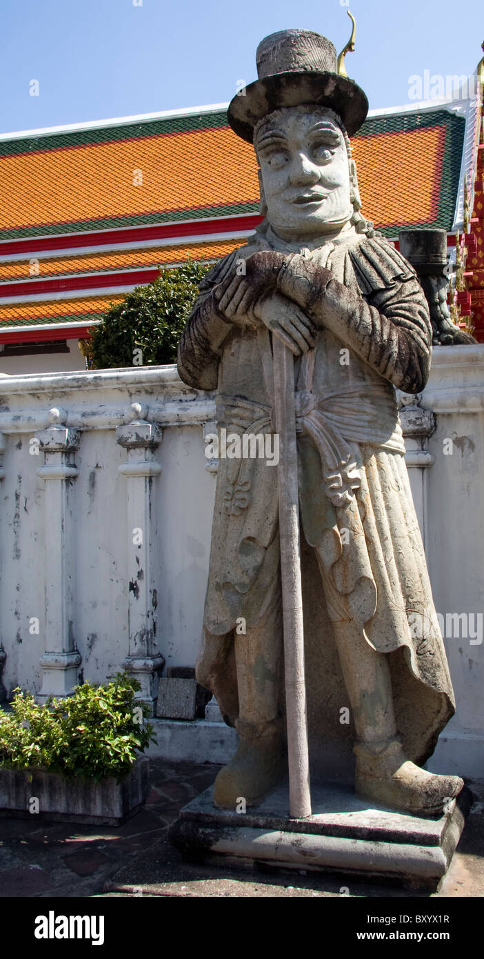 Guardian statue in Wat Po, Bangkok Stock Photo - Alamy