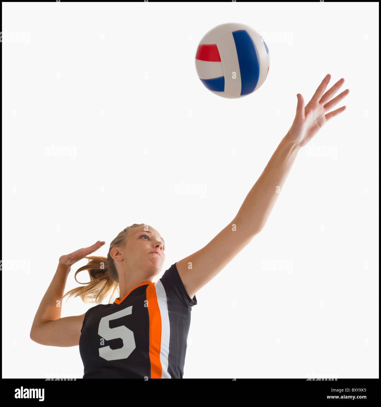 Girl serving a volleyball hi-res stock photography and images - Alamy