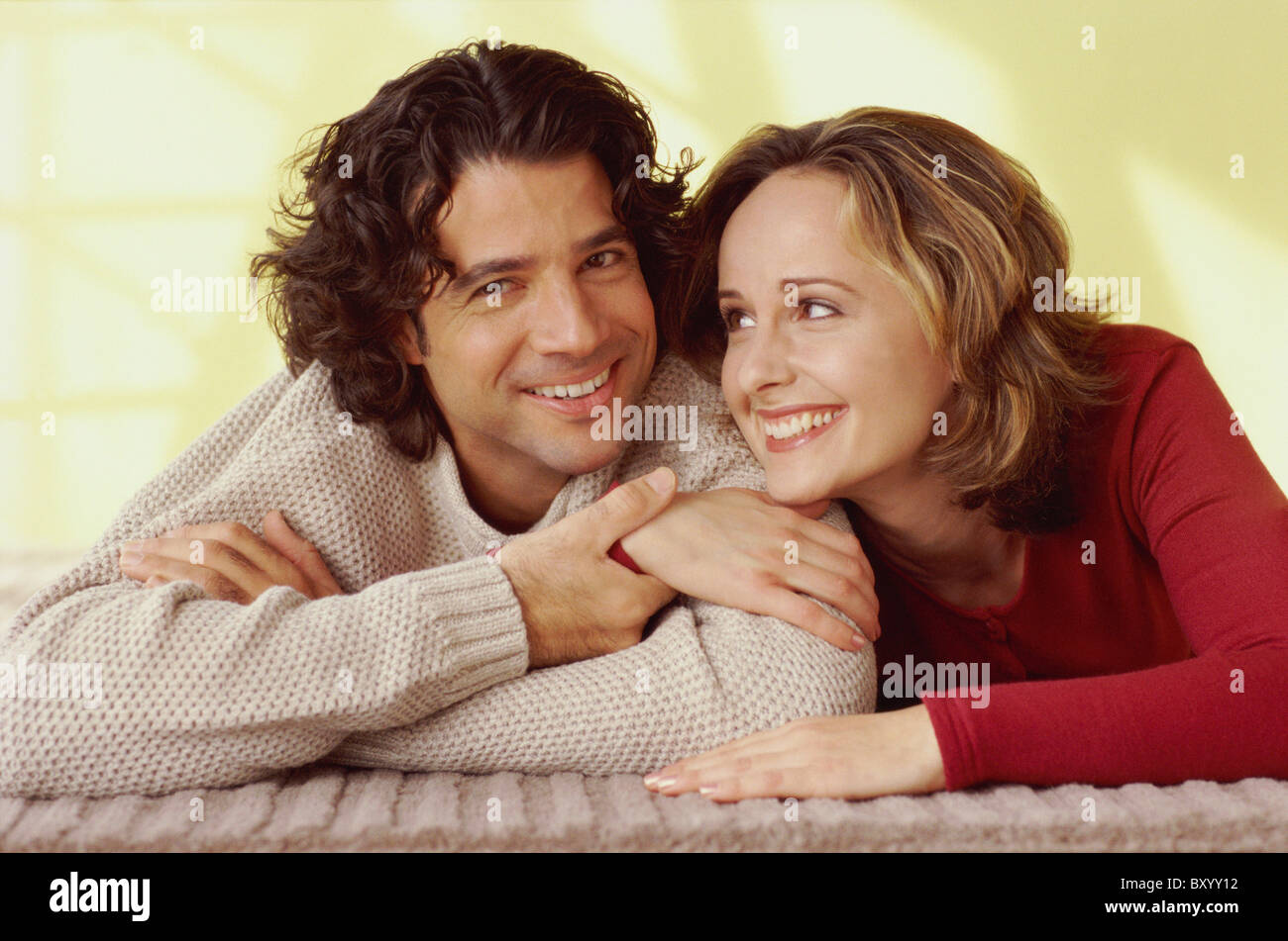 Happy couple relaxing together Stock Photo - Alamy