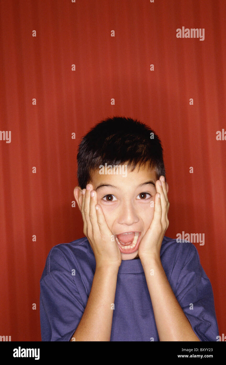 Surprised young boy Stock Photo - Alamy