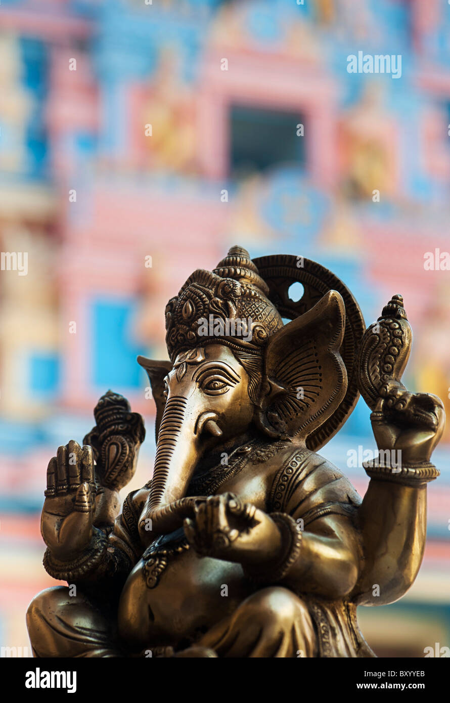 Bronze ganesha statue in front of Sathya Sai Baba's Gopuram ashram gate ...