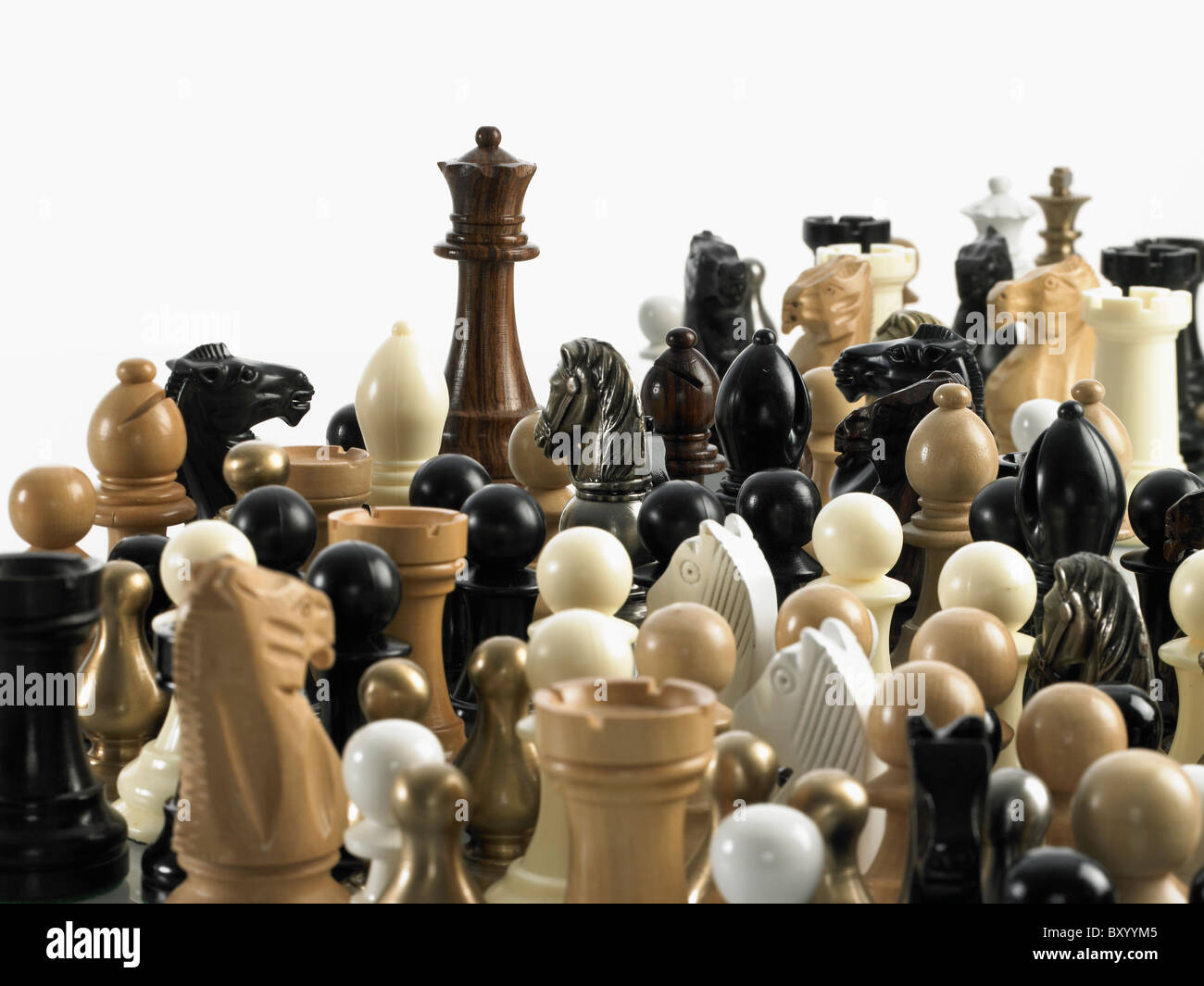 Queen with group of chess pieces Stock Photo - Alamy