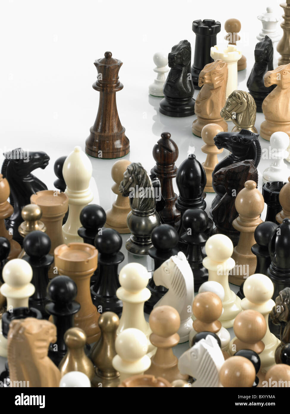 Queen with group of chess pieces Stock Photo - Alamy