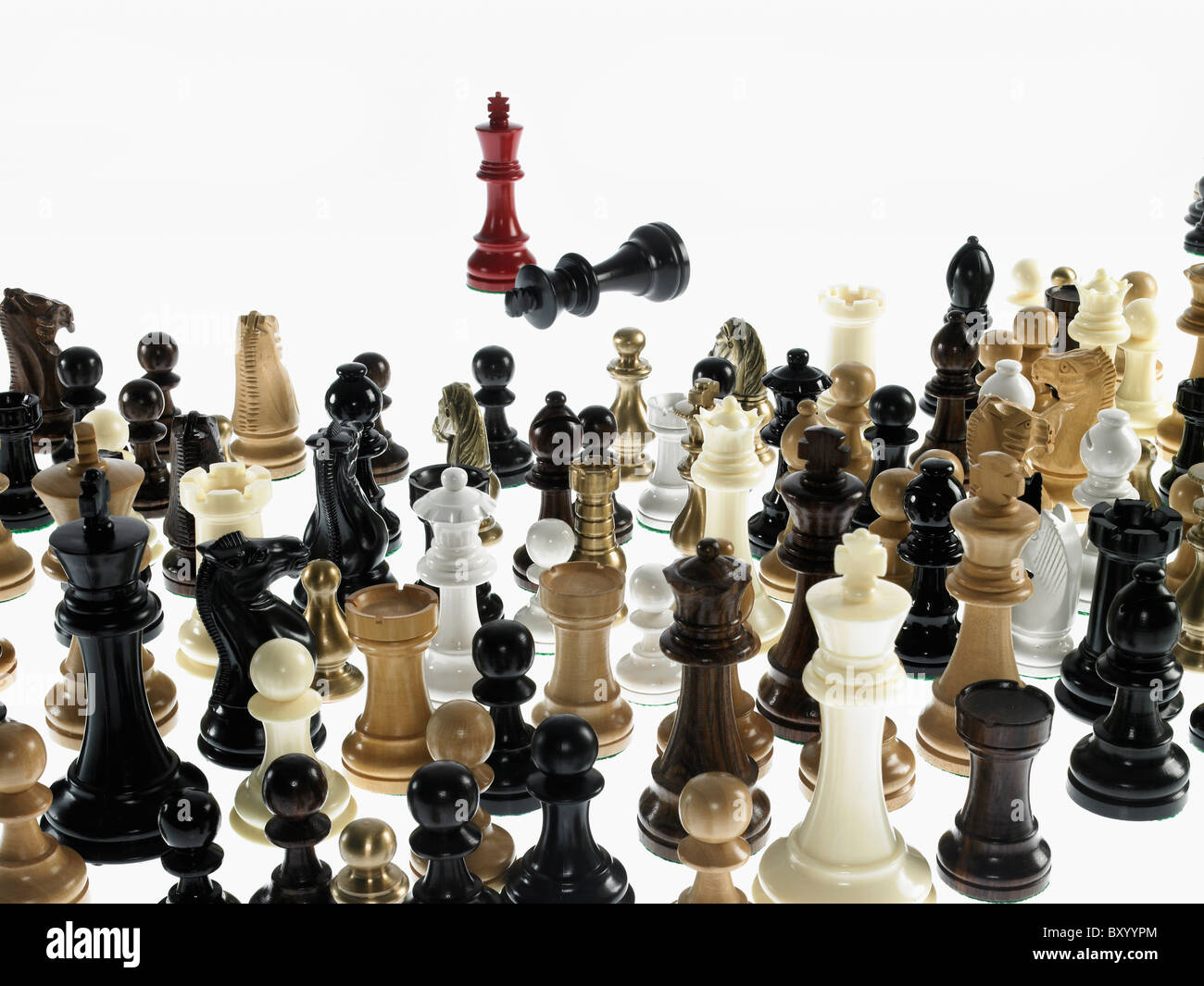 Group of chess pieces watching kings fighting Stock Photo - Alamy