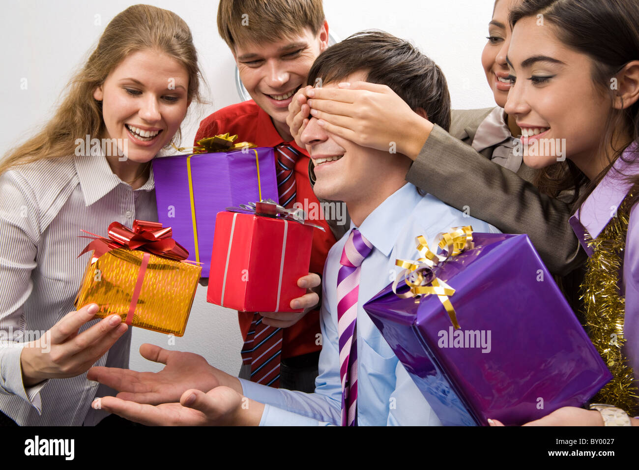 Image of man guessing what present he is going to receive from his ...