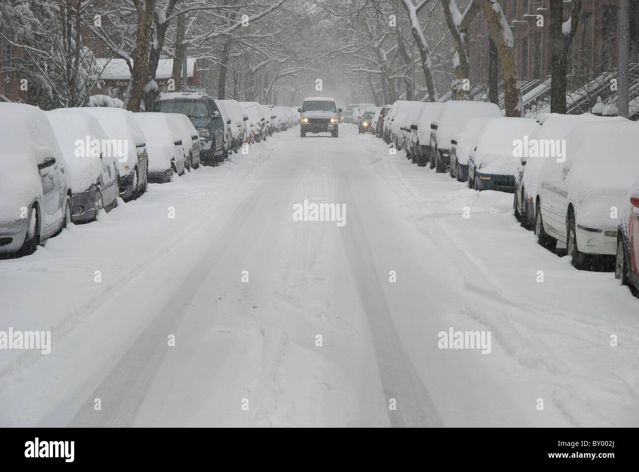 Street in snow Stock Photo - Alamy