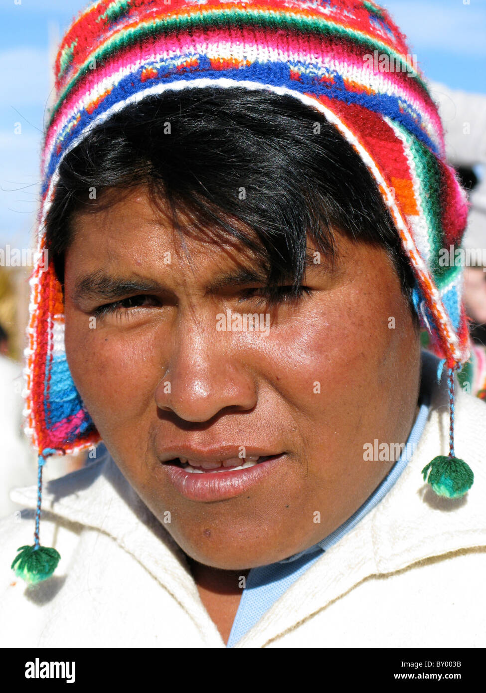 Uros Islands, Peru - Aymara man on Lake Titicaca Stock Photo - Alamy