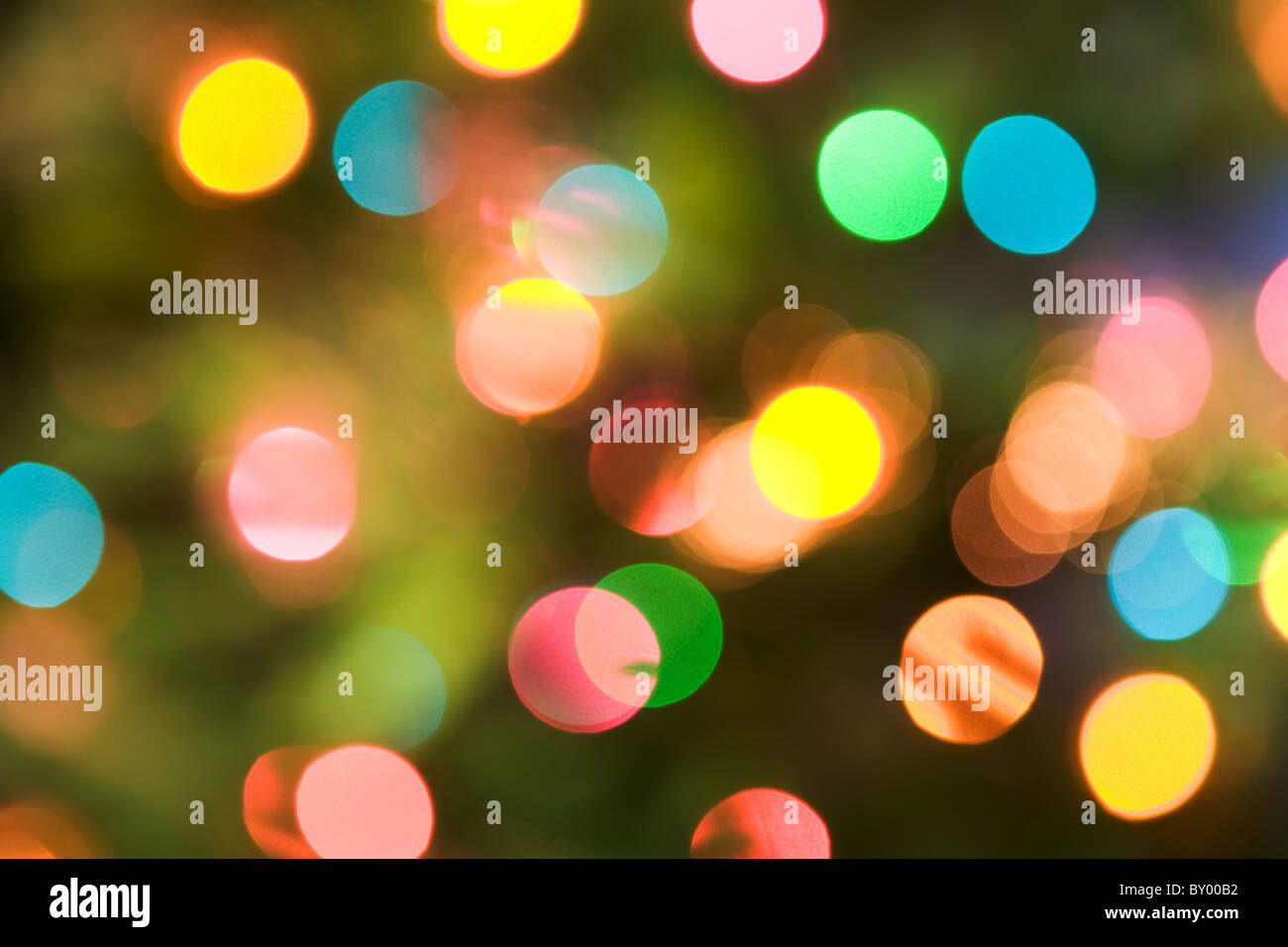Glittering Christmas background with red, blue, yellow and green ...