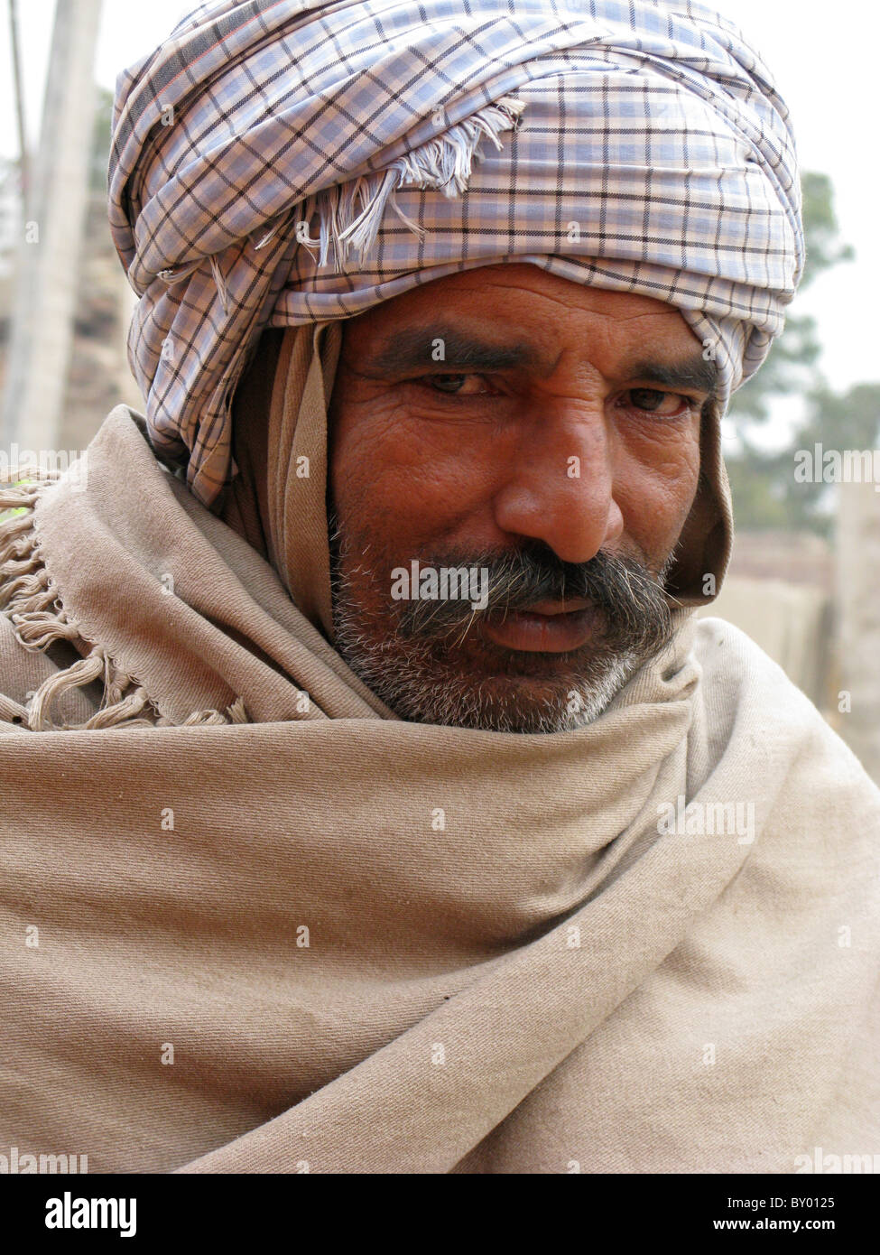 Indian camel man. camel herder on a road side near Delhi Stock Photo ...