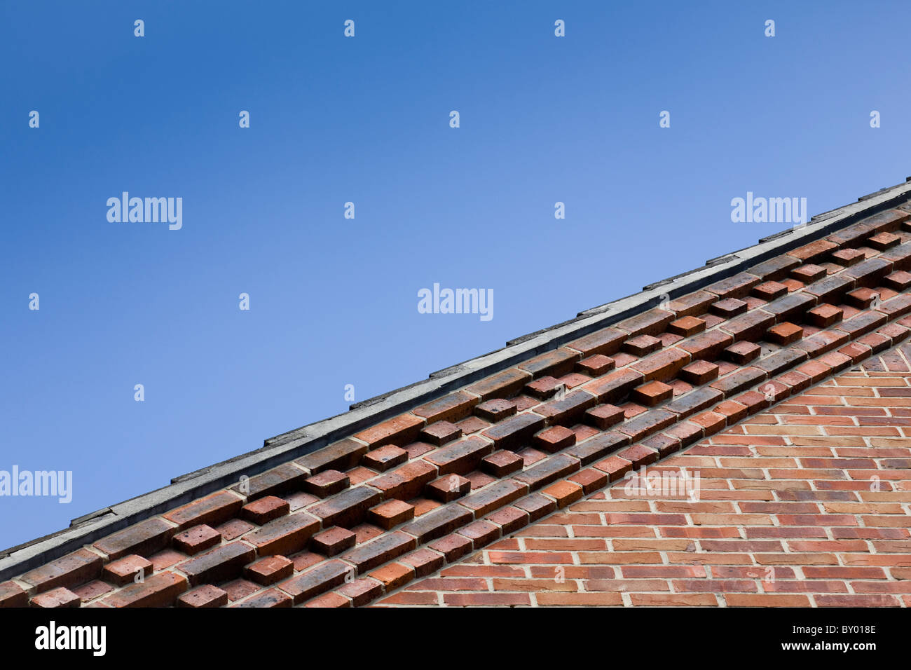 Close-up of decorative brickwork forming part of the gable end of a ...