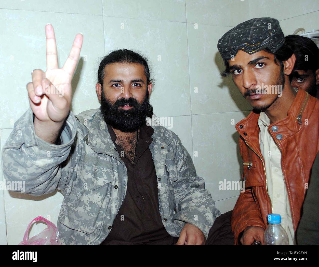 Jamhori Watan Party (JWP) leader, Shah Zain Bugti makes victory sign ...
