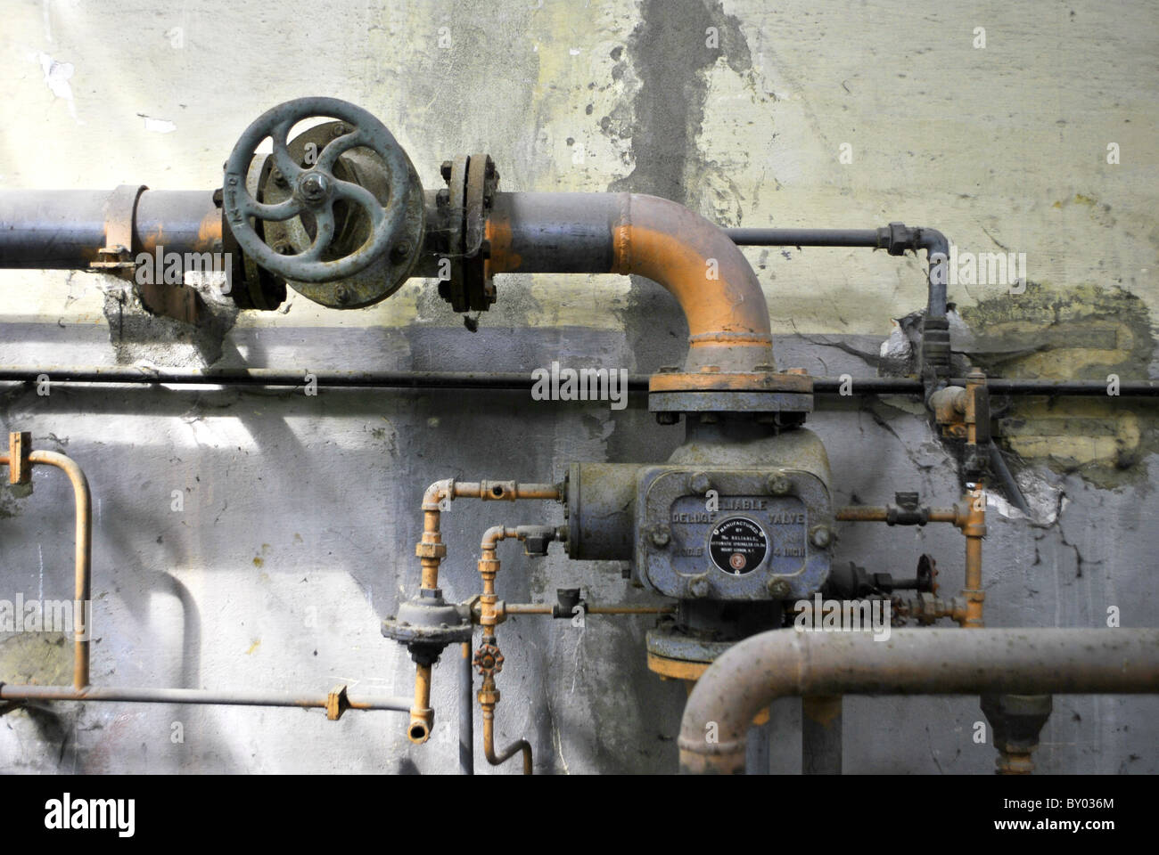 hydraulic hoses in the old abandoned factory Stock Photo - Alamy