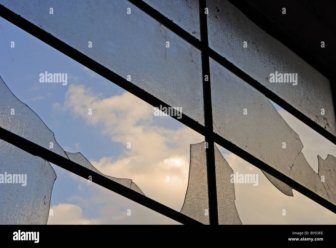window and broken glass in old abandoned building Stock Photo - Alamy