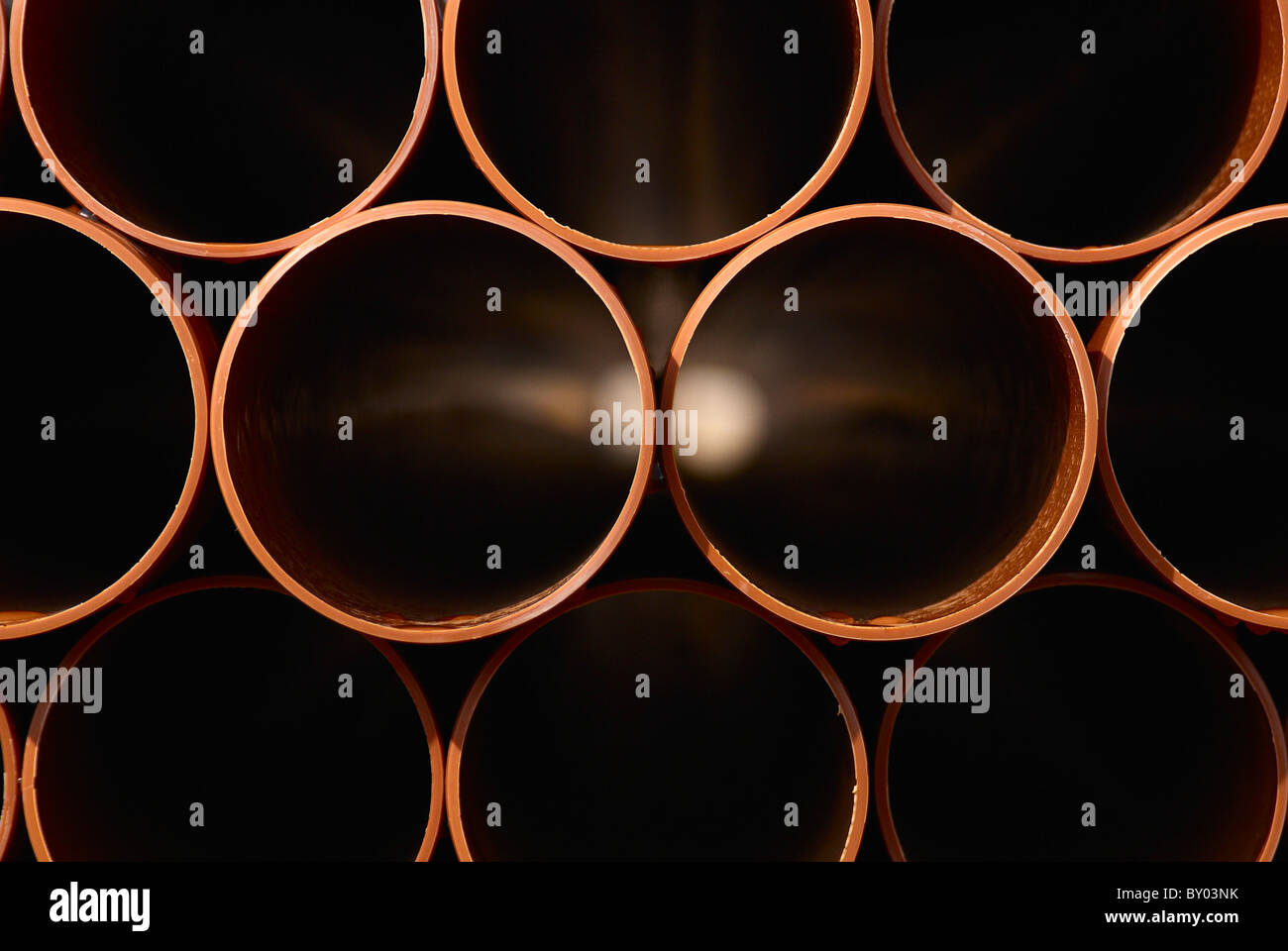 Stack of pipes on a building merchant yard Stock Photo - Alamy