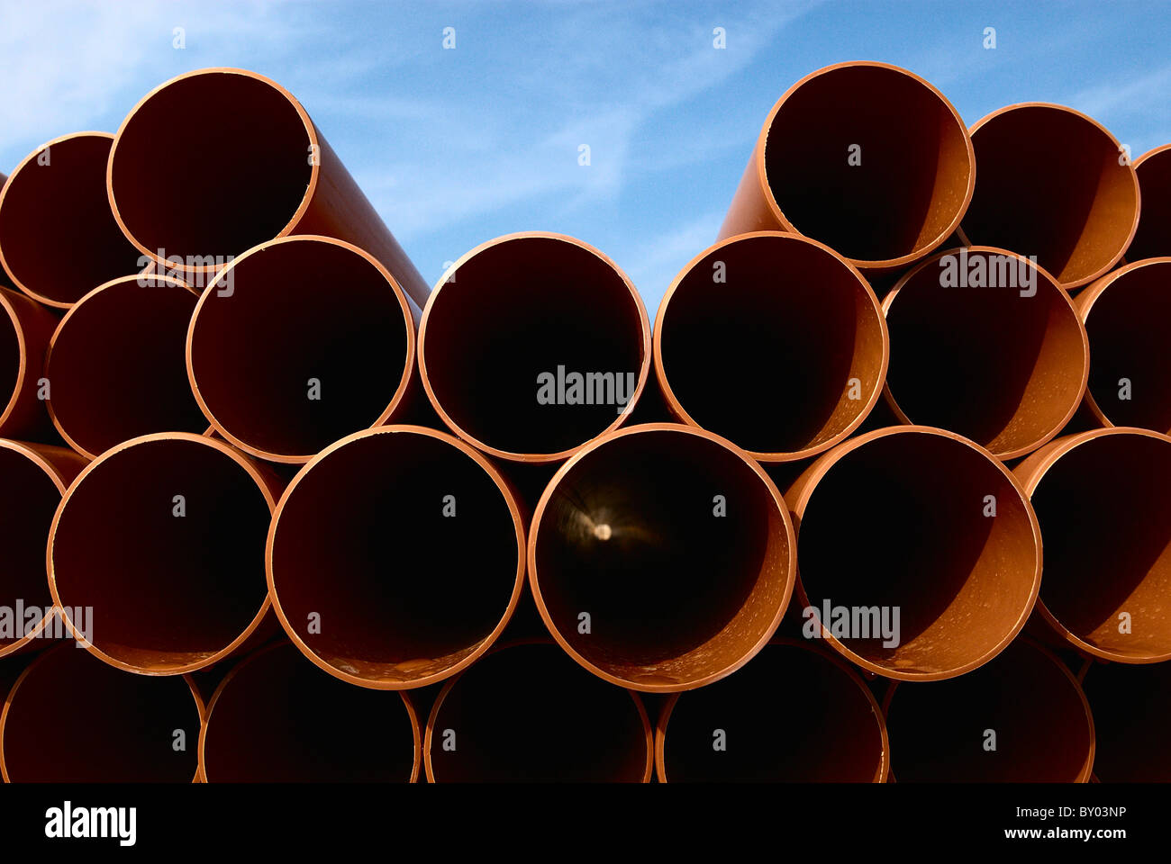 Stack of pipes on a building merchant yard Stock Photo - Alamy