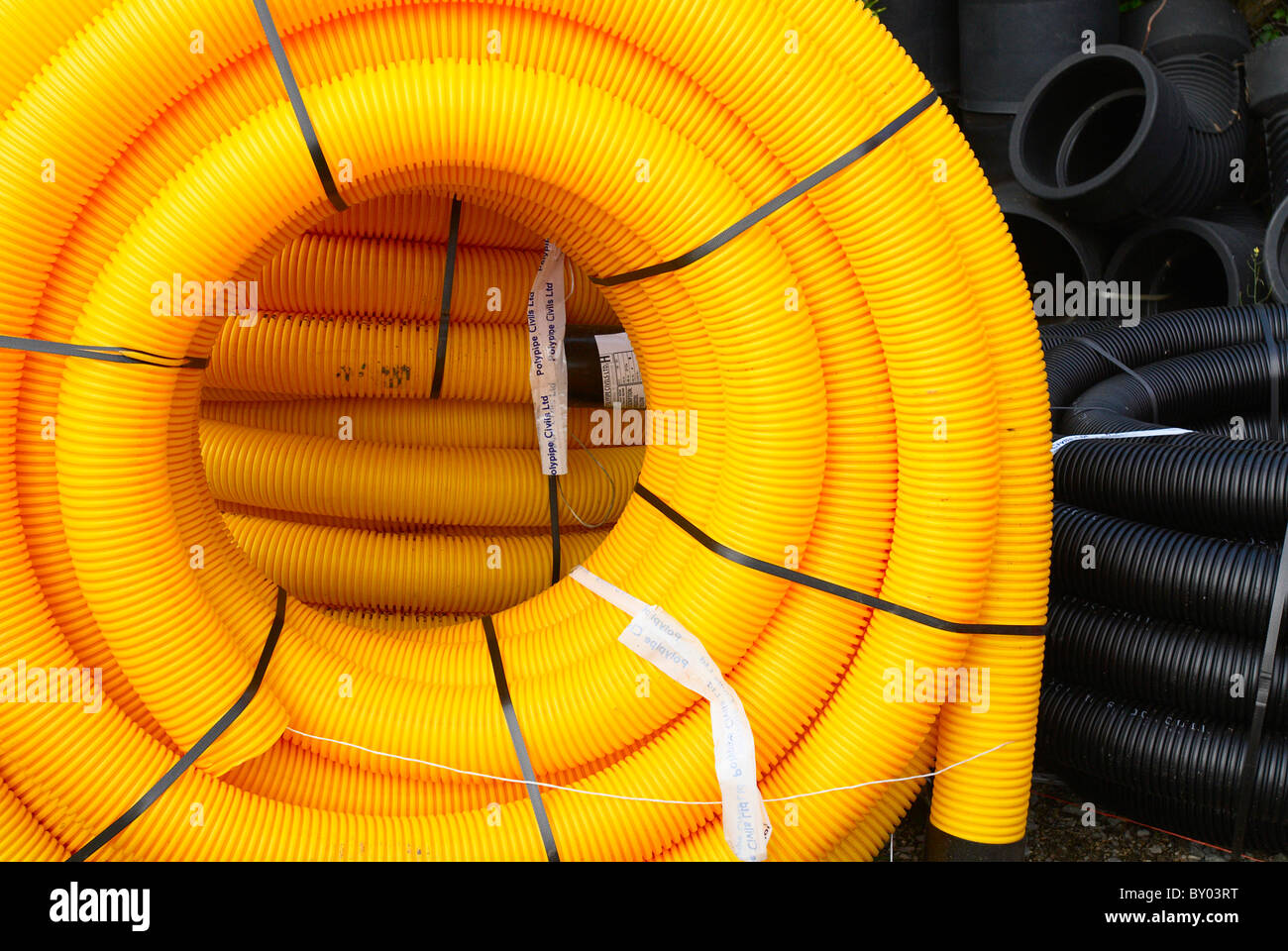 Stack of pipes on a building merchant yard Stock Photo - Alamy