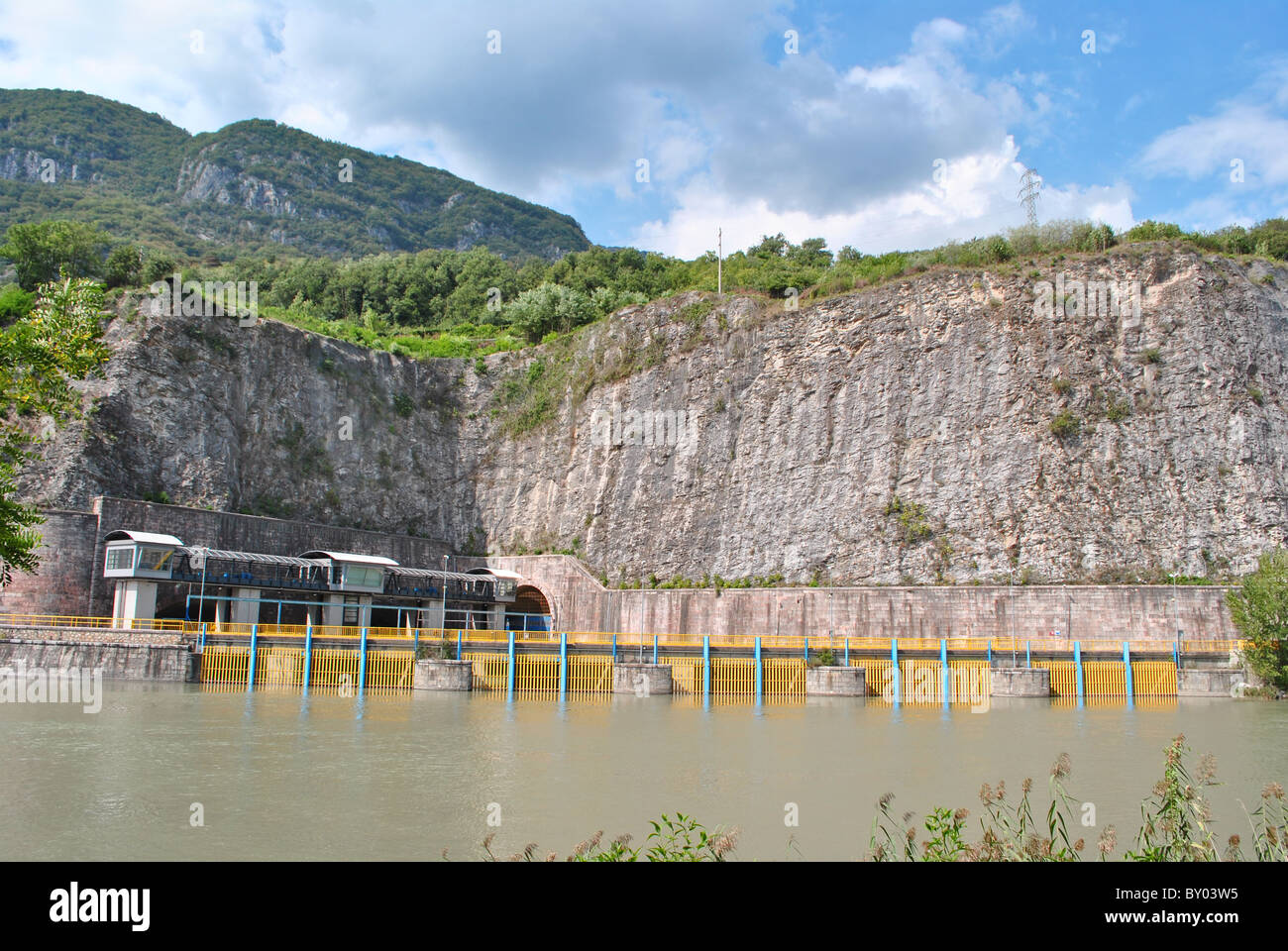artificial dam on the river, surrounded by nature Stock Photo - Alamy