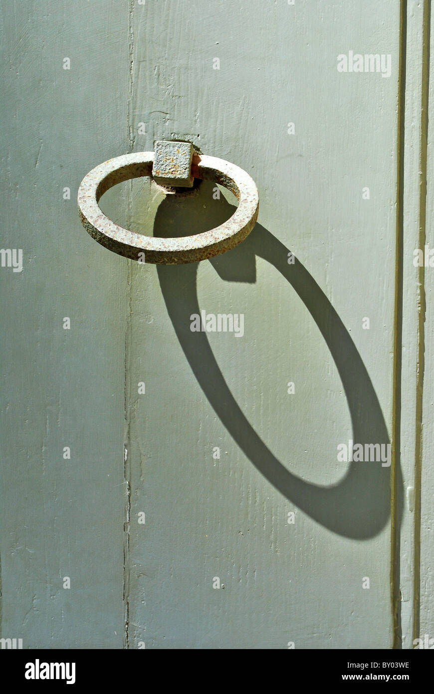 handle iron wooden door and shadow Stock Photo - Alamy