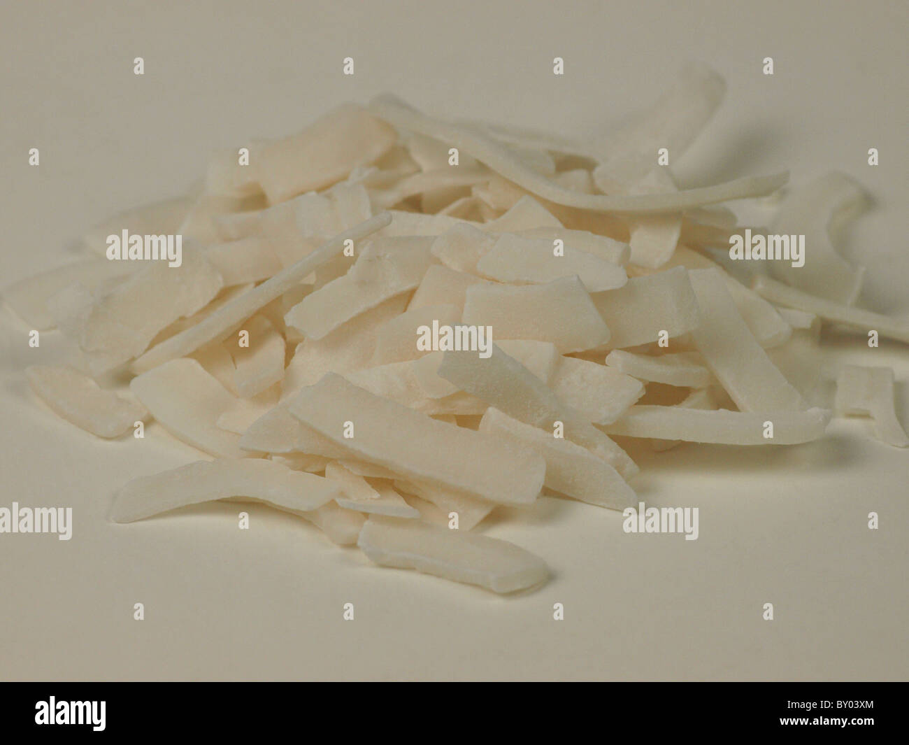 Sweetened sliced coconut Stock Photo - Alamy