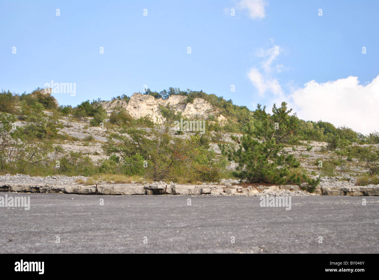 slope with smooth slab of rock Stock Photo - Alamy