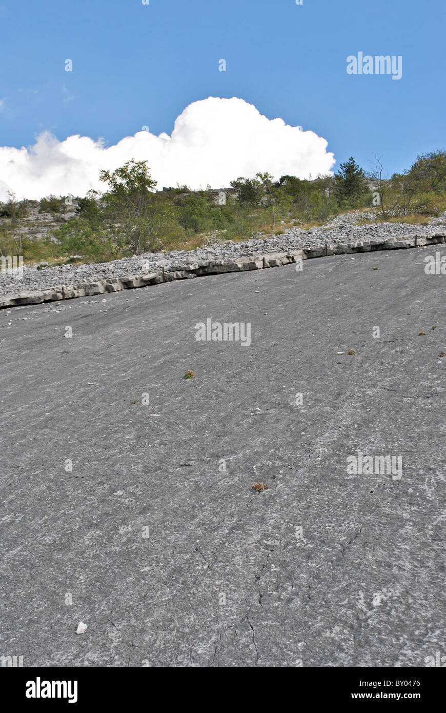 slope with smooth slab of rock Stock Photo - Alamy
