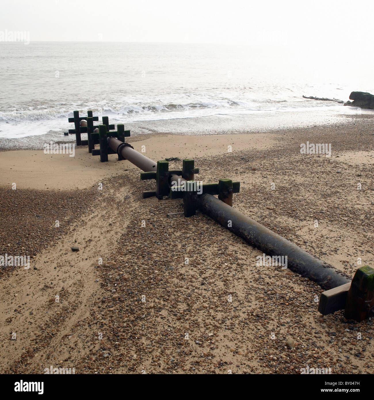 Pipe on beach Felixstowe Suffolk UK Stock Photo - Alamy