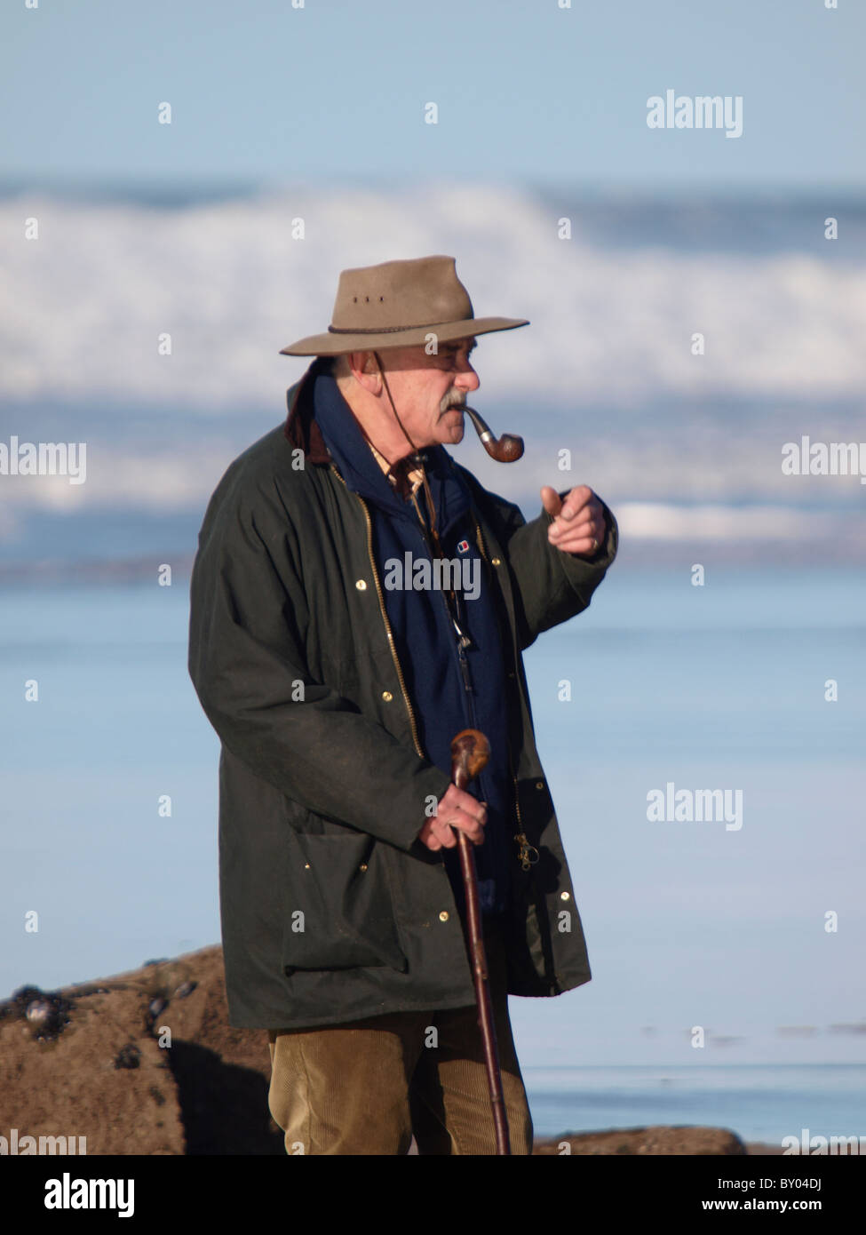 Old man smoking pipe hi-res stock photography and images - Alamy