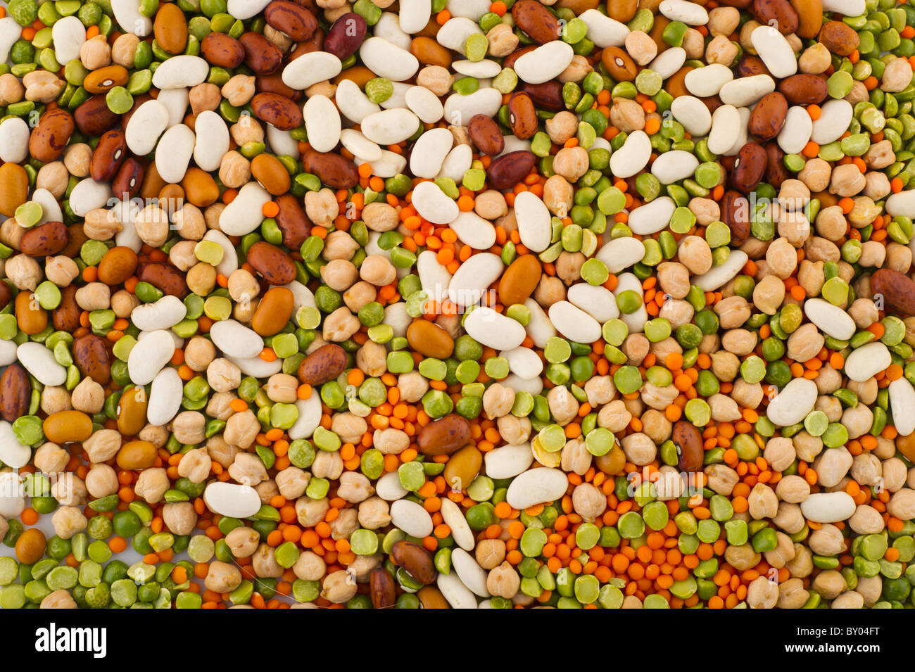 Various legumes in a pattern as background Stock Photo - Alamy