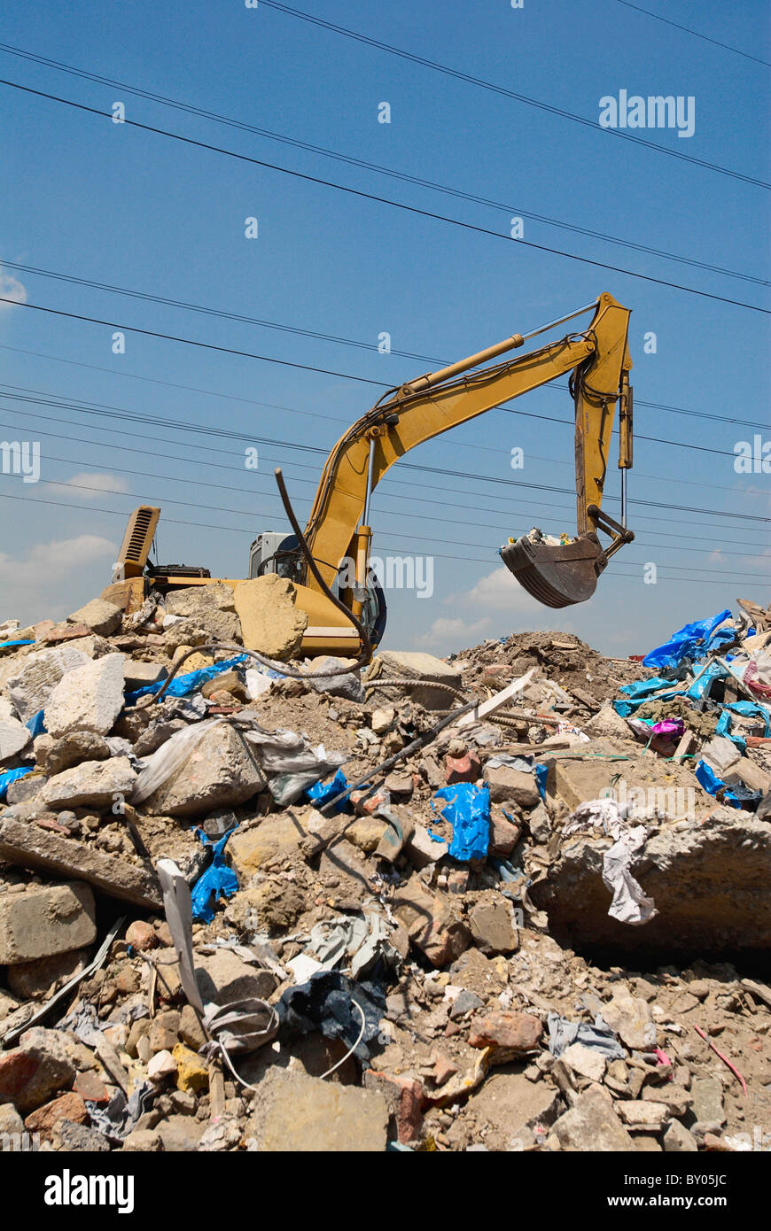 Digger at demolition site Stratford London UK Stock Photo - Alamy
