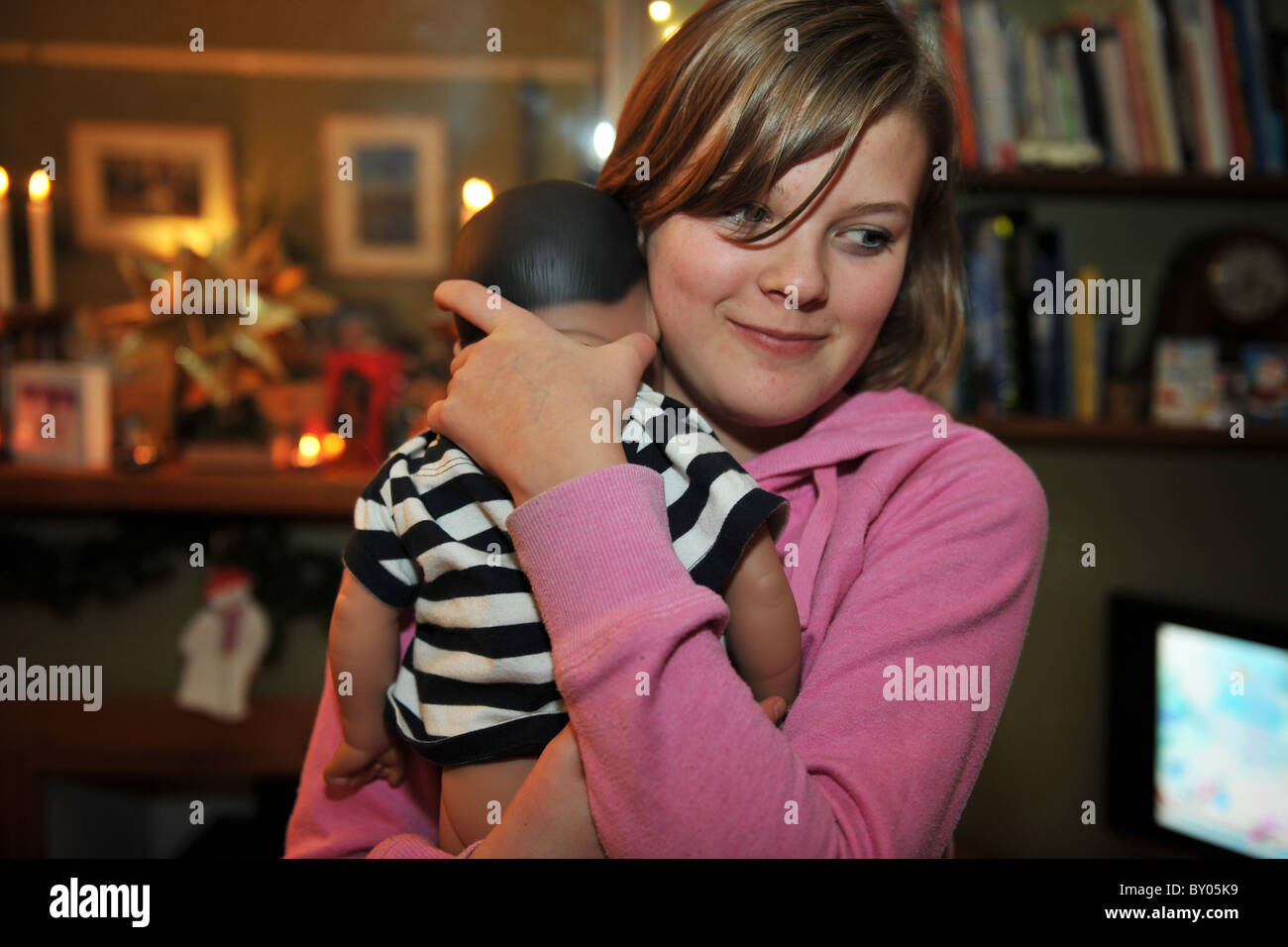 A 13 year old girl minds a 'real care baby' for the weekend as part of ...