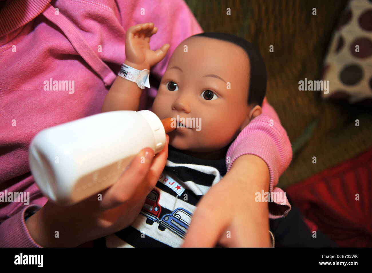 A 13 year old girl minds a 'real care baby' for the weekend as part of ...