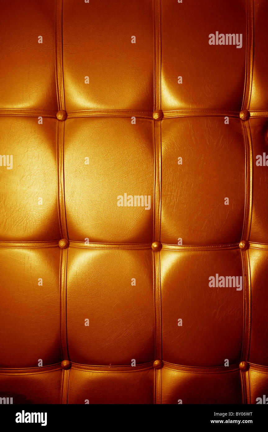 Luxury genuine shining leather. Golden color. Useful as a background ...