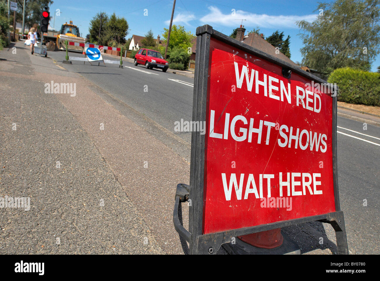 Wait here sign hi-res stock photography and images - Alamy