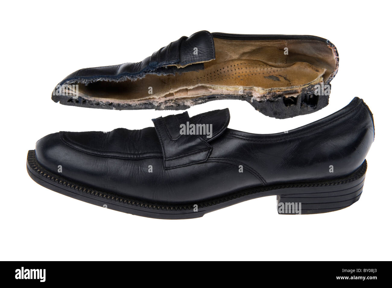 object on white - Damaged old shoes Stock Photo - Alamy