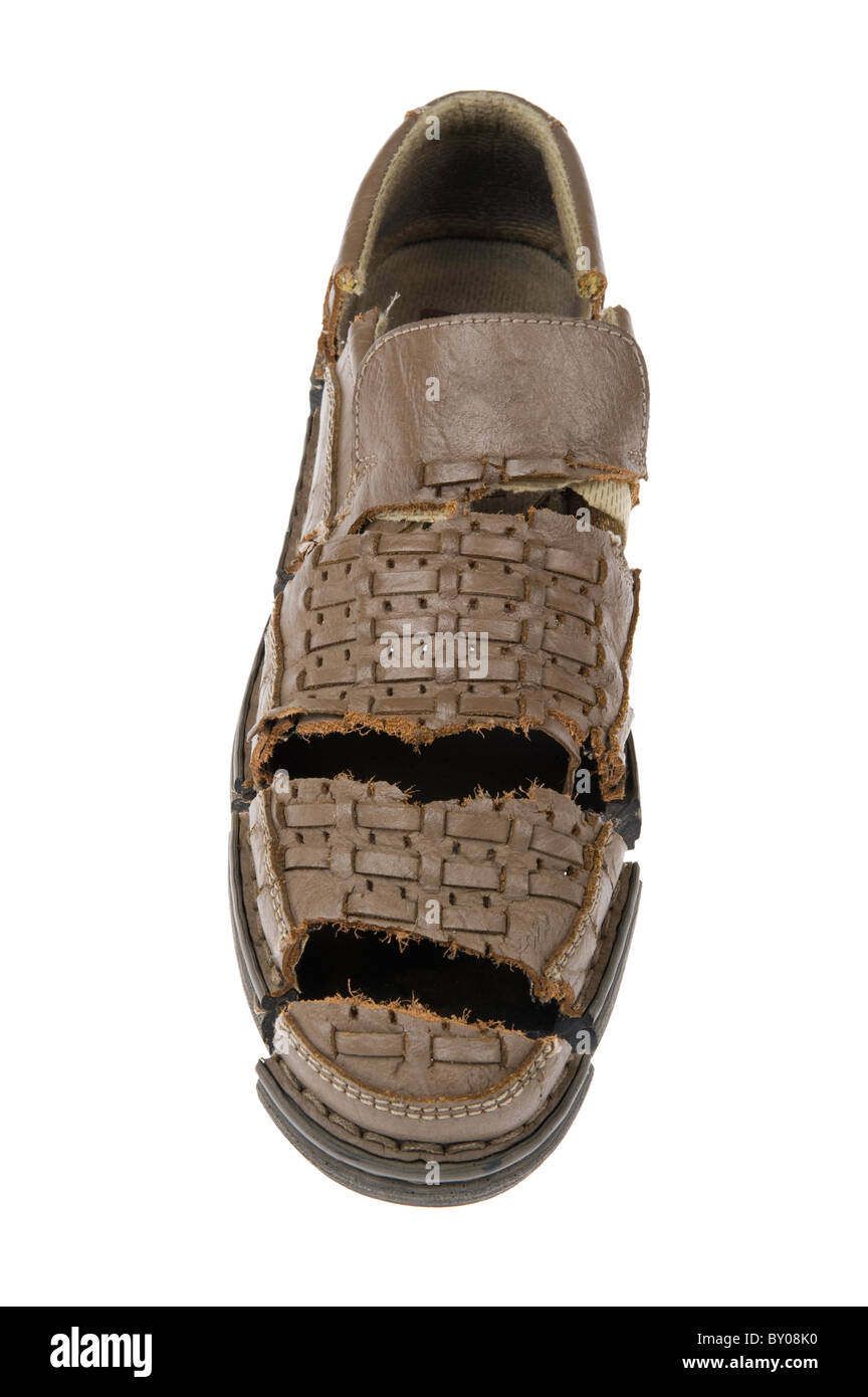 object on white - Damaged old shoes Stock Photo - Alamy