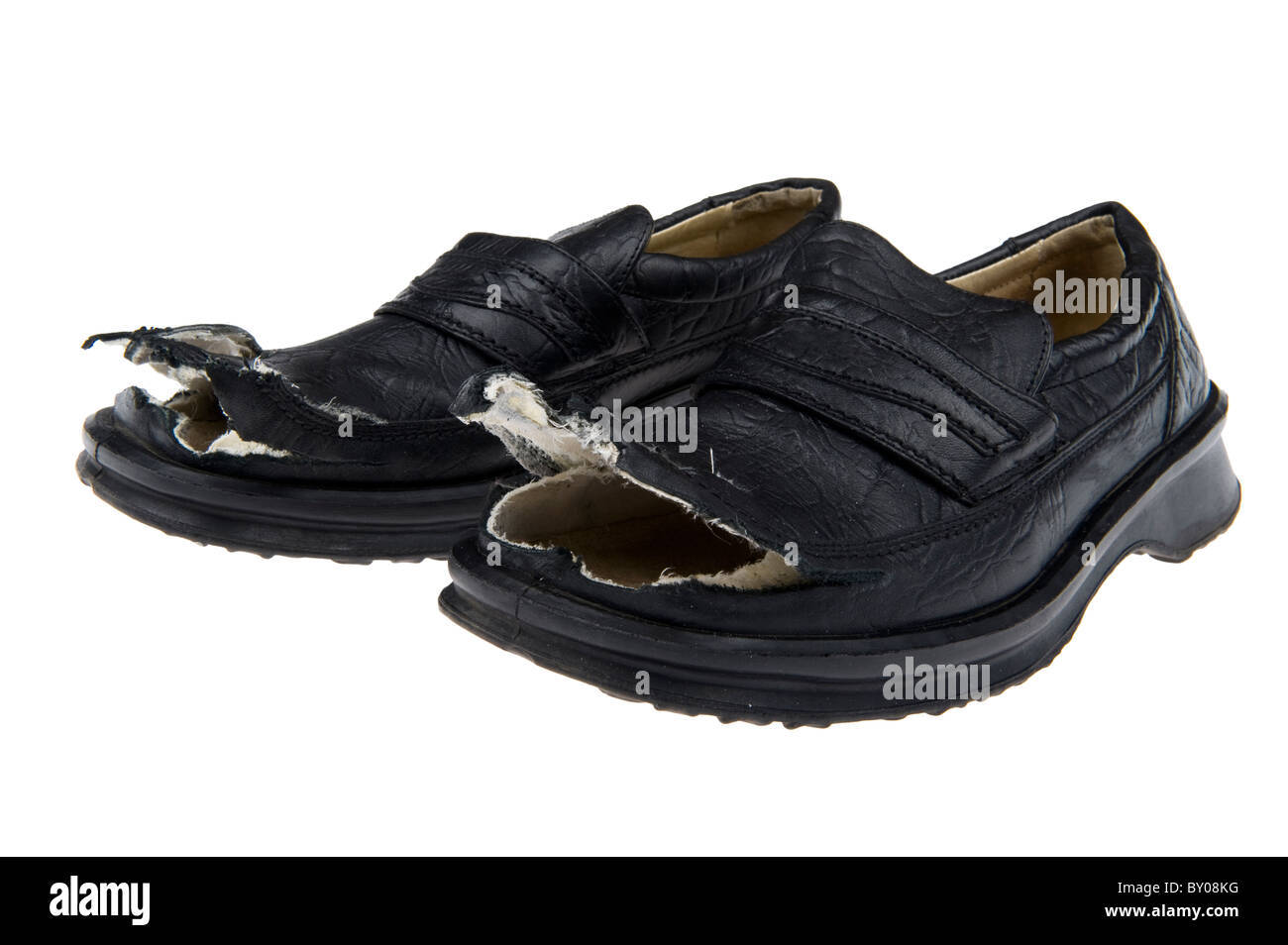 object on white - Damaged old shoes Stock Photo - Alamy