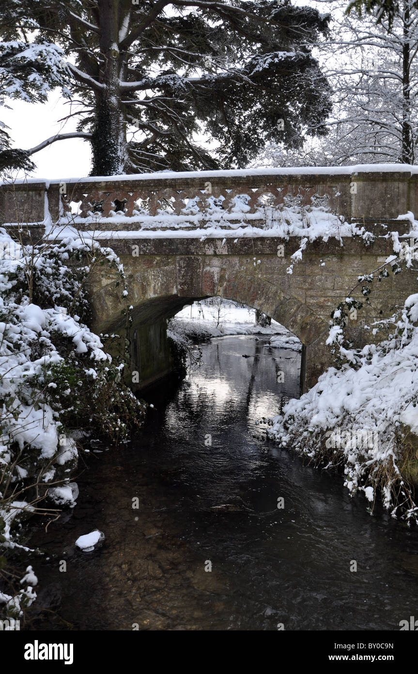an ornate stone bridge over the river churn - winter 2011 Stock Photo ...
